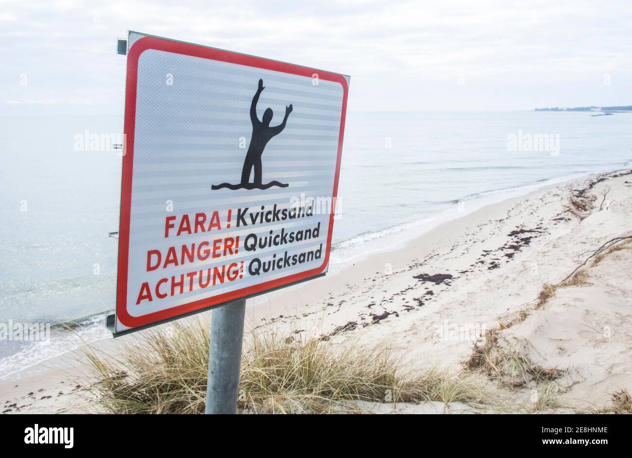 Sign, Warning for quicksand at sandy beach, Ystad, Scania, Sweden Stock ...