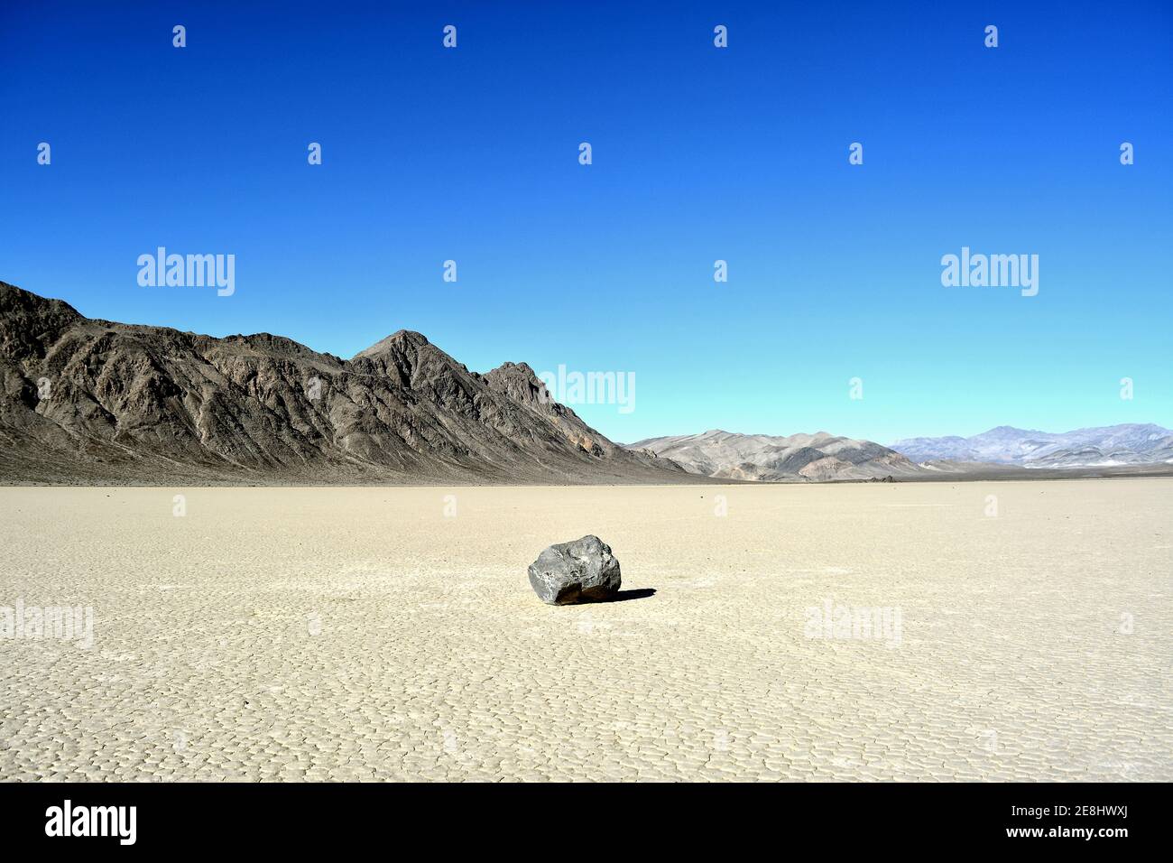 sailing rock leaving a long trail in the desert of the Racetrack Playa ...