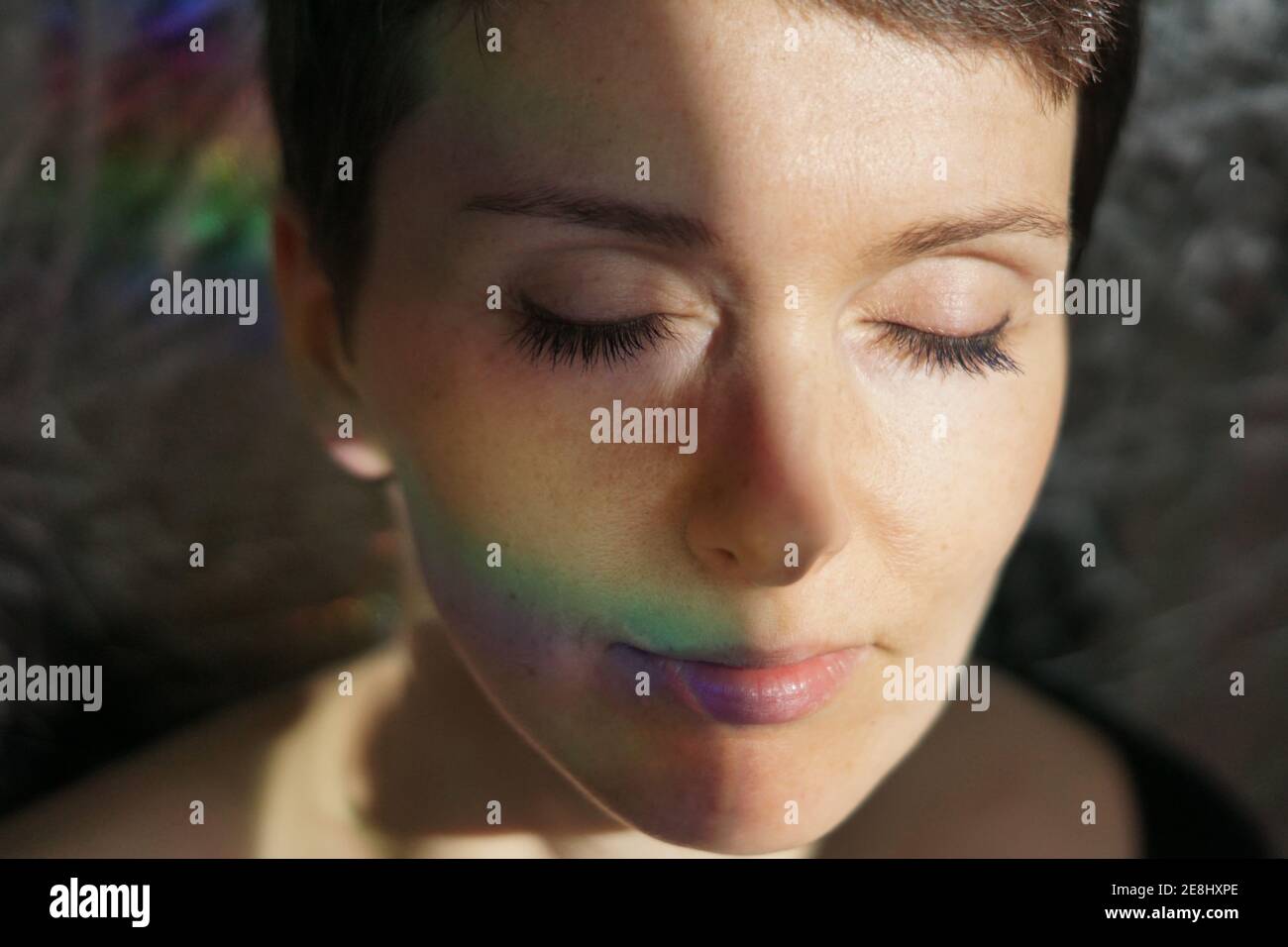 Crop feminine thoughtful adult lady with natural makeup and short hair ...