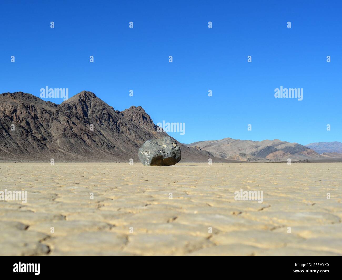 sailing rock leaving a long trail in the desert of the Racetrack Playa ...