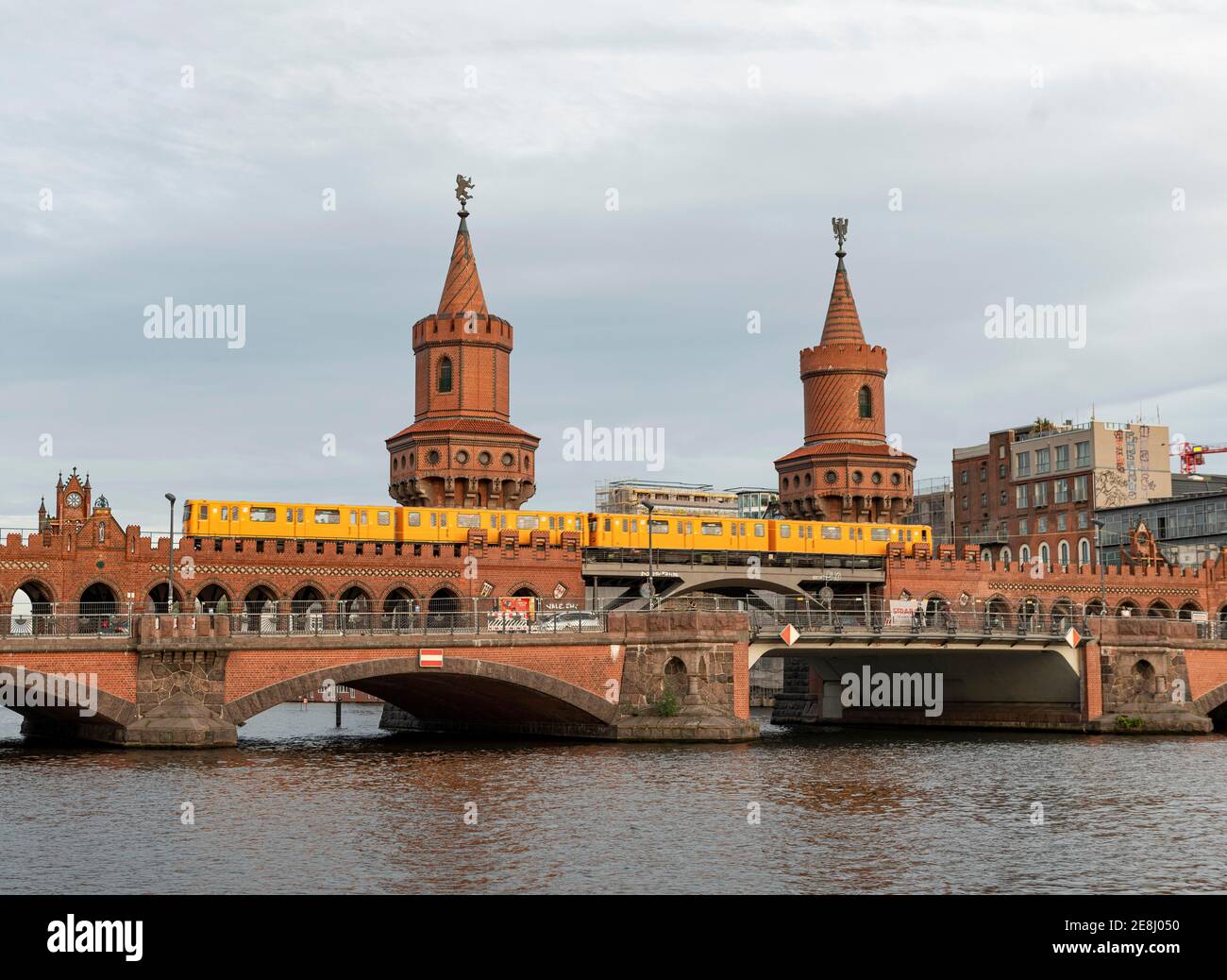 Yellow S-Bahn on the Oberbaum Bridge between Kreuzberg and ...