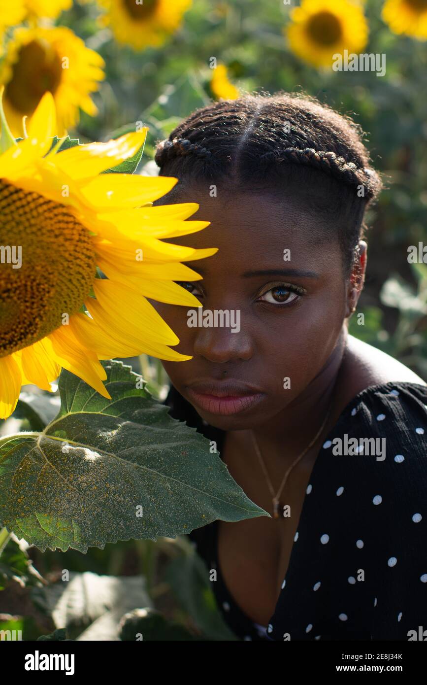 African american woman in sunflower hi-res stock photography and images ...