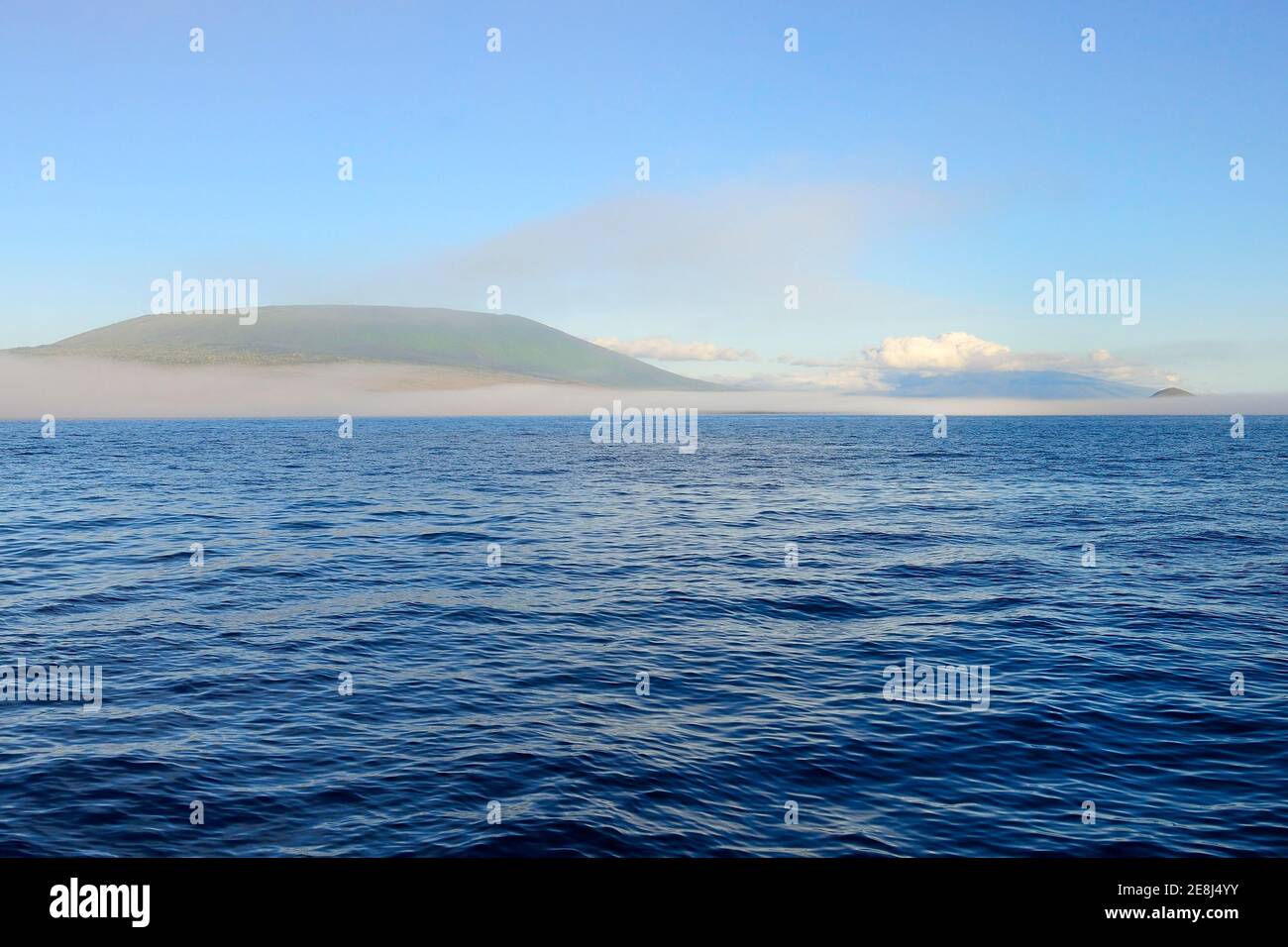 Clouds of fog at Ecuador Volcano, Isabela Island, Galapagos, Ecuador ...