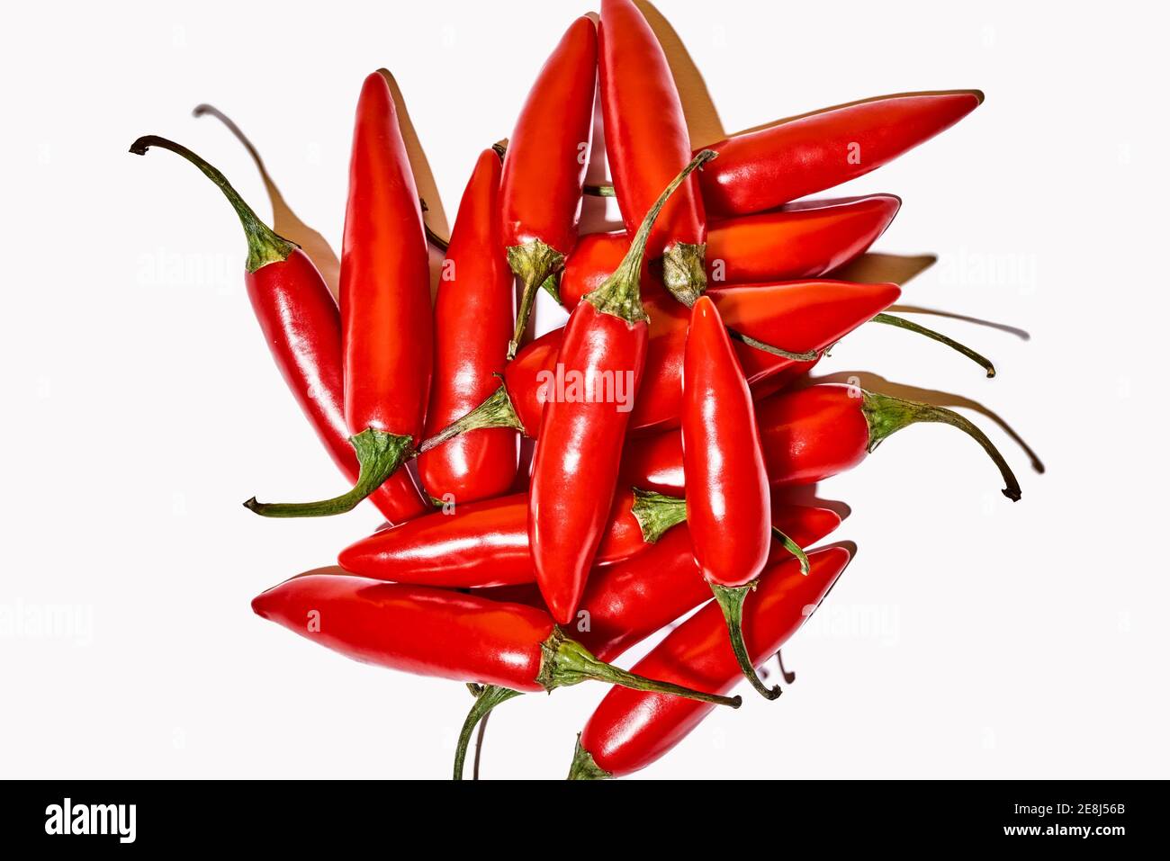Top view composition with red fresh exotic peppers used as spice or ...