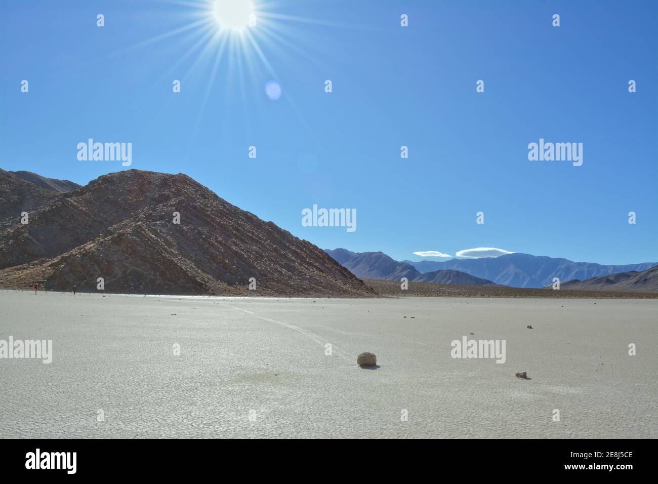 sailing rock leaving a long trail in the desert of the Racetrack Playa ...