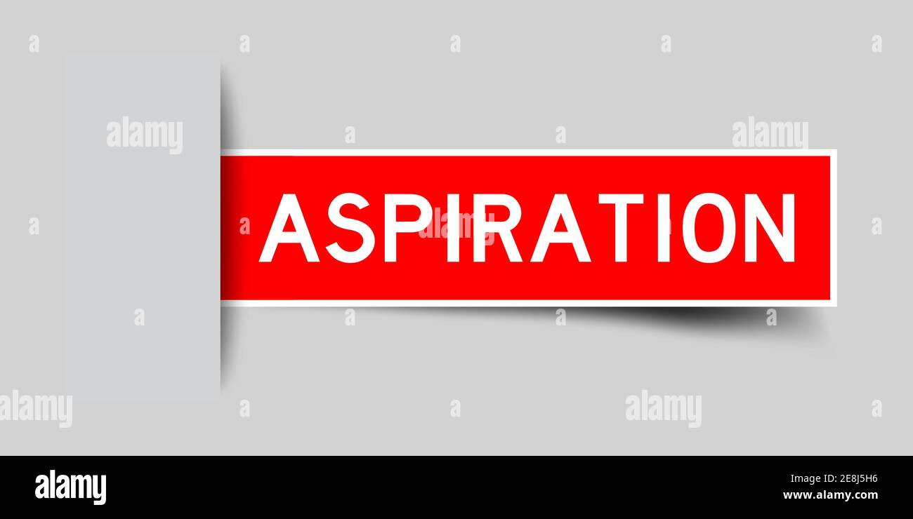 Inserted red color label sticker with word aspiration on gray ...