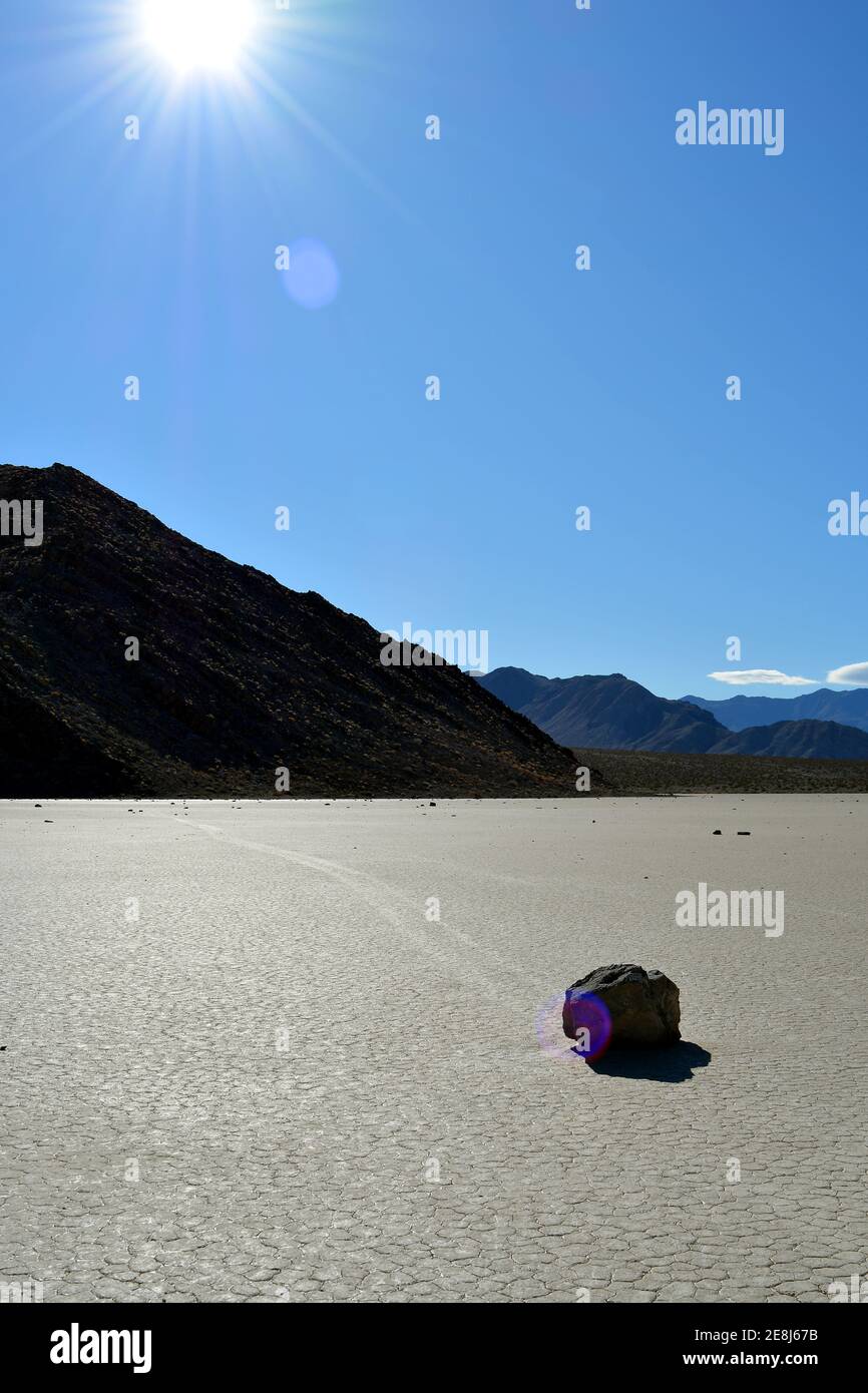 sailing rock leaving a long trail in the desert of the Racetrack Playa ...