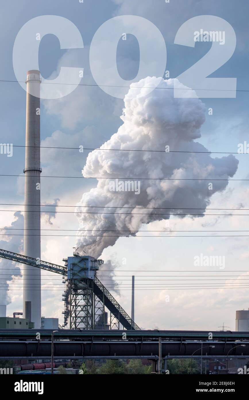 A vertical shot of an industrial chimney with CO2 emissions Stock Photo ...