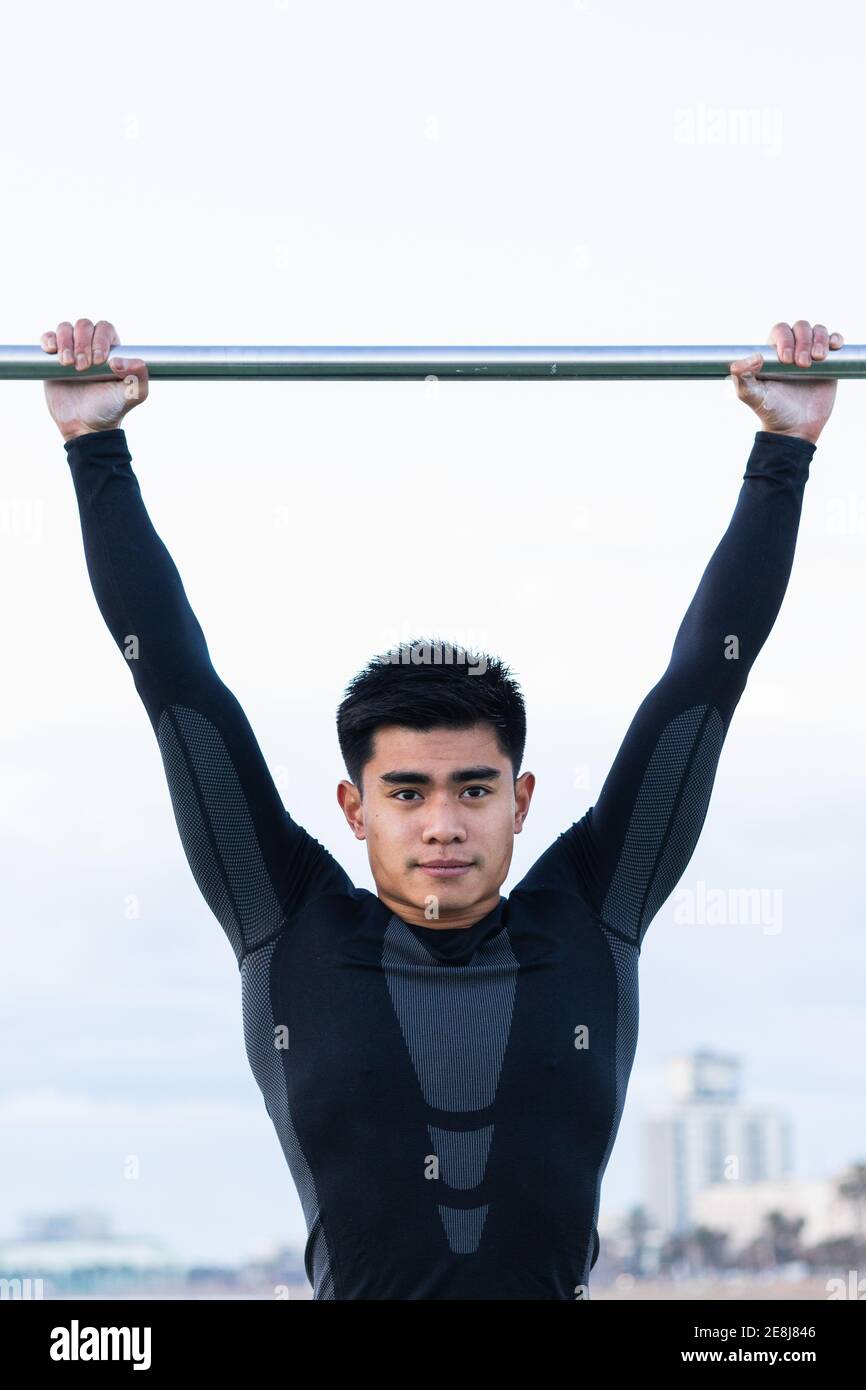 Man on monkey bars hi-res stock photography and images - Alamy