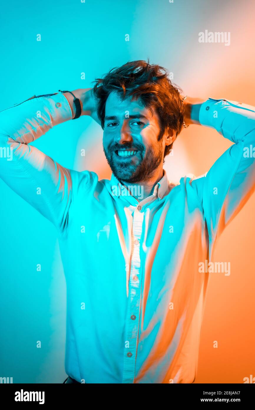 Suit arms behind head hi-res stock photography and images - Alamy