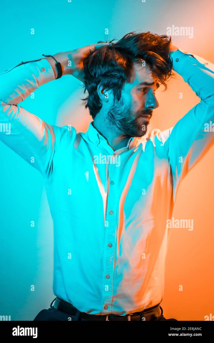 Suit arms behind head hi-res stock photography and images - Alamy