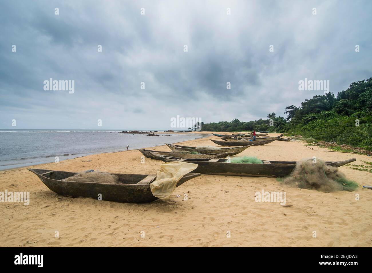Fishing boats on the beach of Kribi, Cameroon Stock Photo - Alamy