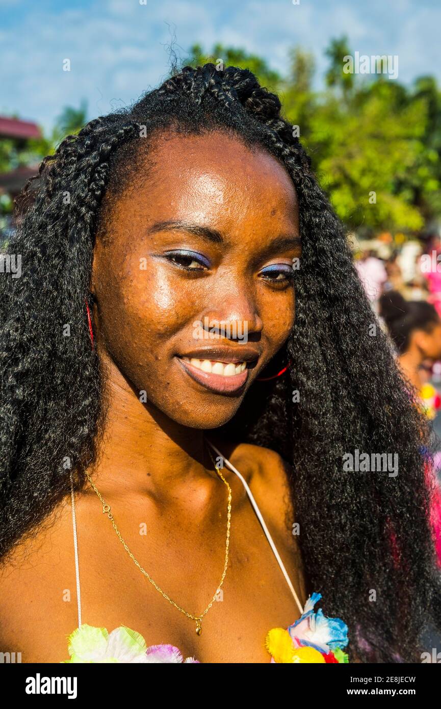 Girl posing at the Carneval in the town of Sao Tome, Sao Tome and ...