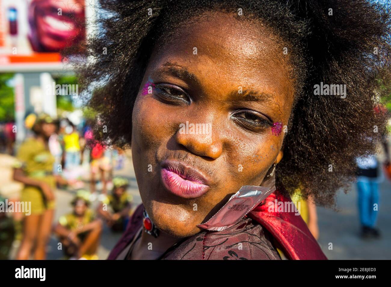 Girl posing at the Carneval in the town of Sao Tome, Sao Tome and ...