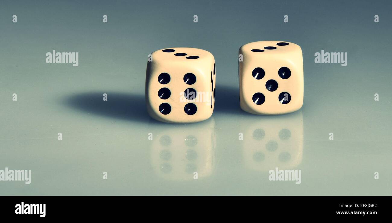 A pair of dice thrown with the number eleven Stock Photo - Alamy