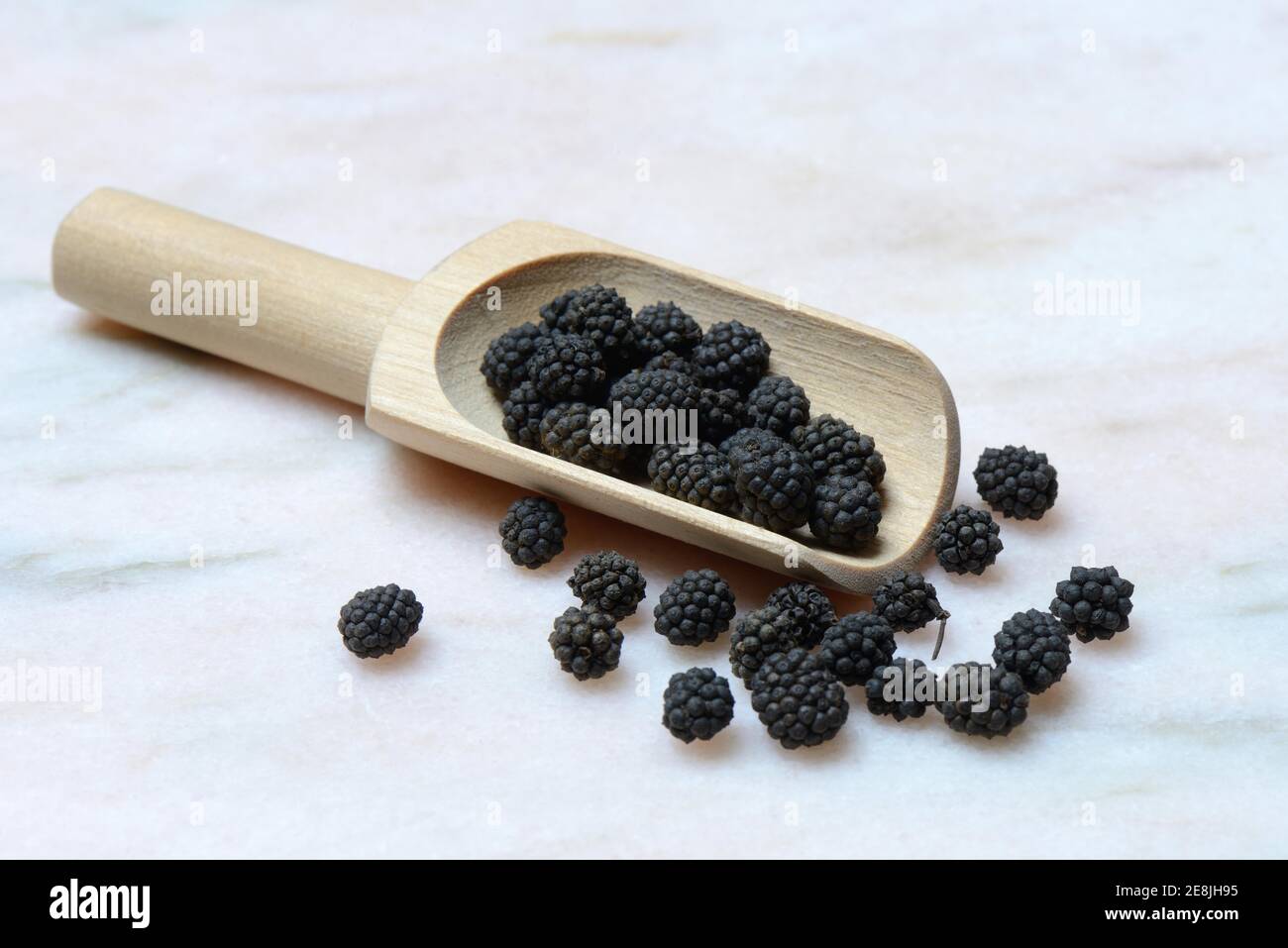 Wild Assam pepper ( Piper longum) in wooden shovel assamica, Assam ...