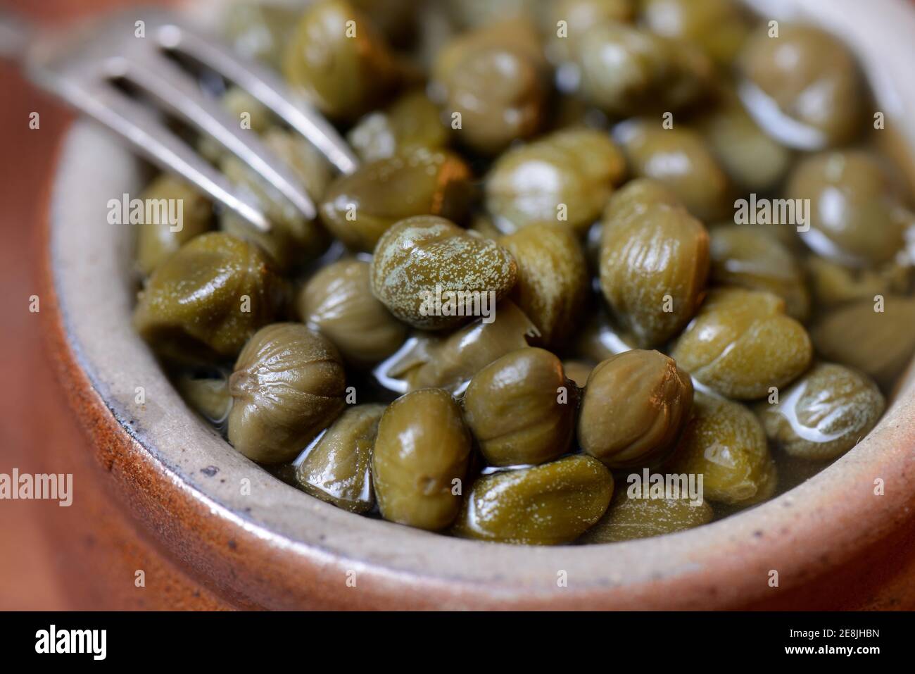 Bowl with capers, pickled ( Capparis spinosa Stock Photo - Alamy