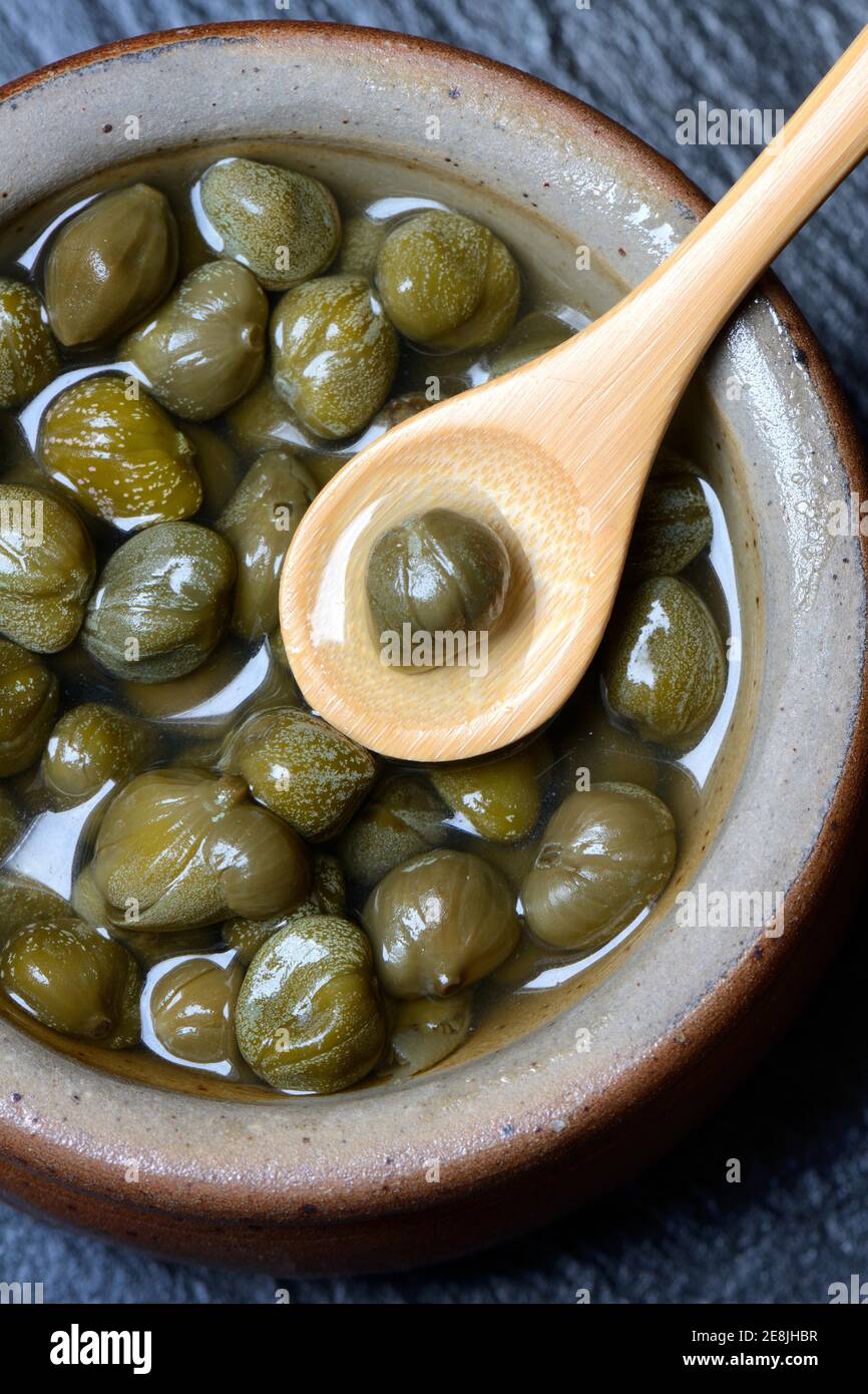 Bowl with capers, pickled ( Capparis spinosa Stock Photo - Alamy