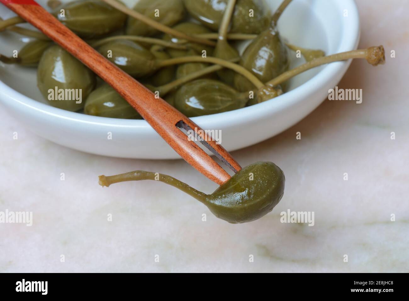 Bowl with caper apples, marinated, caper apple ( Capparis spinosa Stock ...