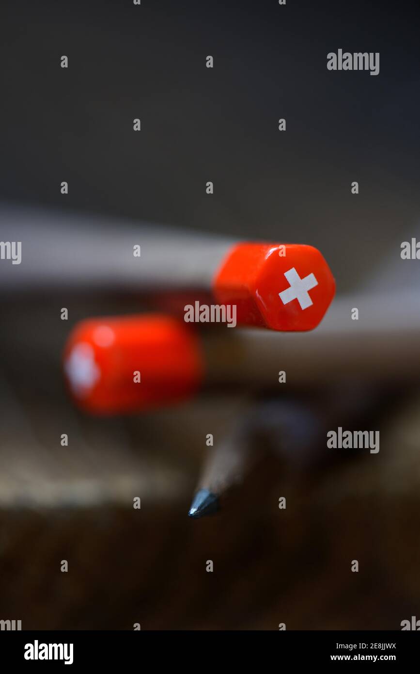 Pencils with Swiss cross Stock Photo - Alamy