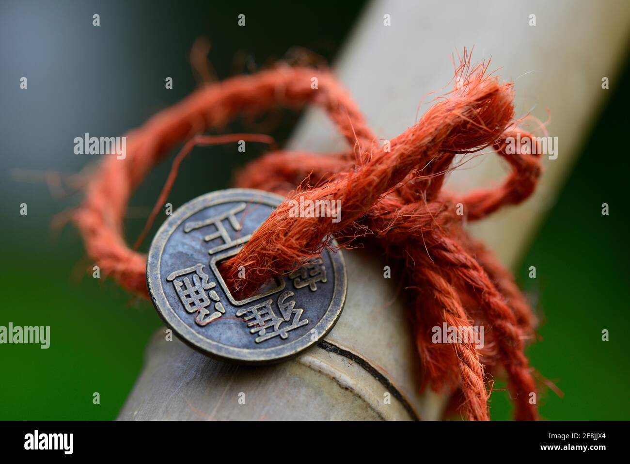 Chinese coins string hi-res stock photography and images - Alamy