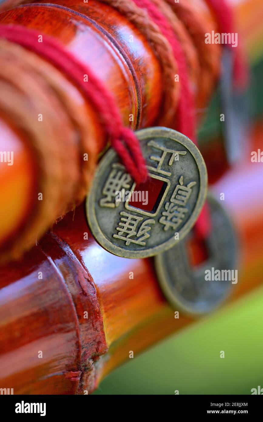 Chinese coins string hi-res stock photography and images - Alamy