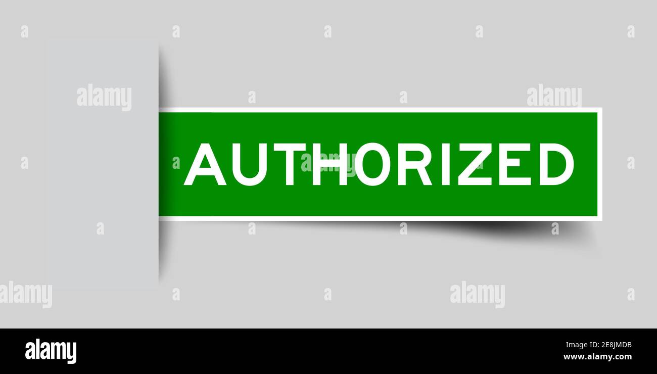 Inserted green color label sticker with word authorized on gray ...