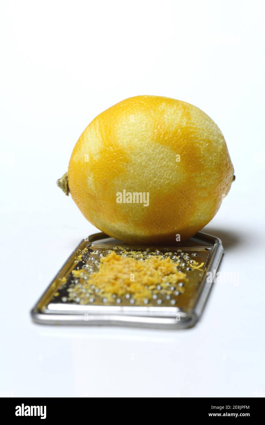 Lemon, lemon rubbing on grater, lemon peel, lemon rind, lemon rubbing ...