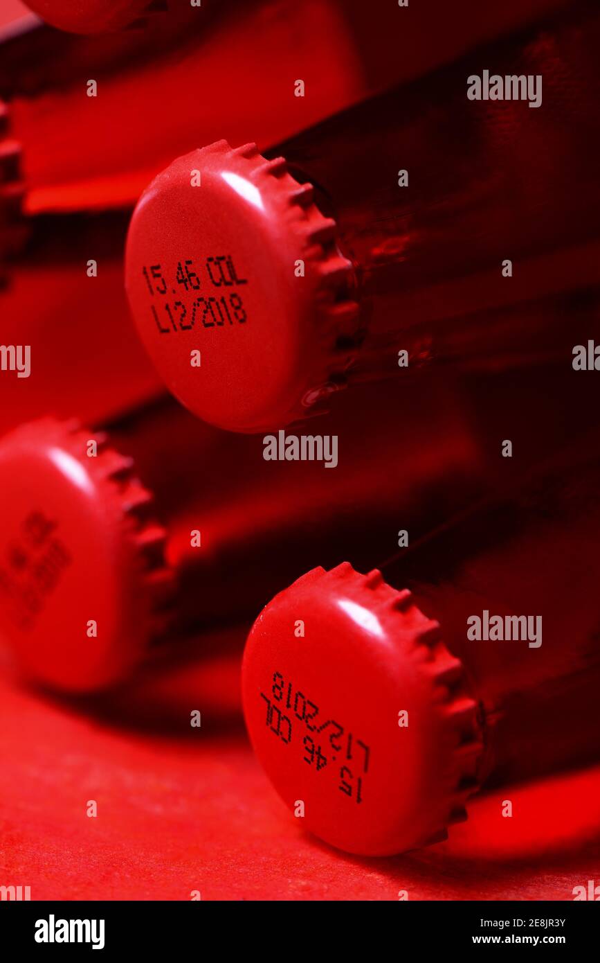 Crown cap with coding on bottles, coding, Campari Stock Photo - Alamy