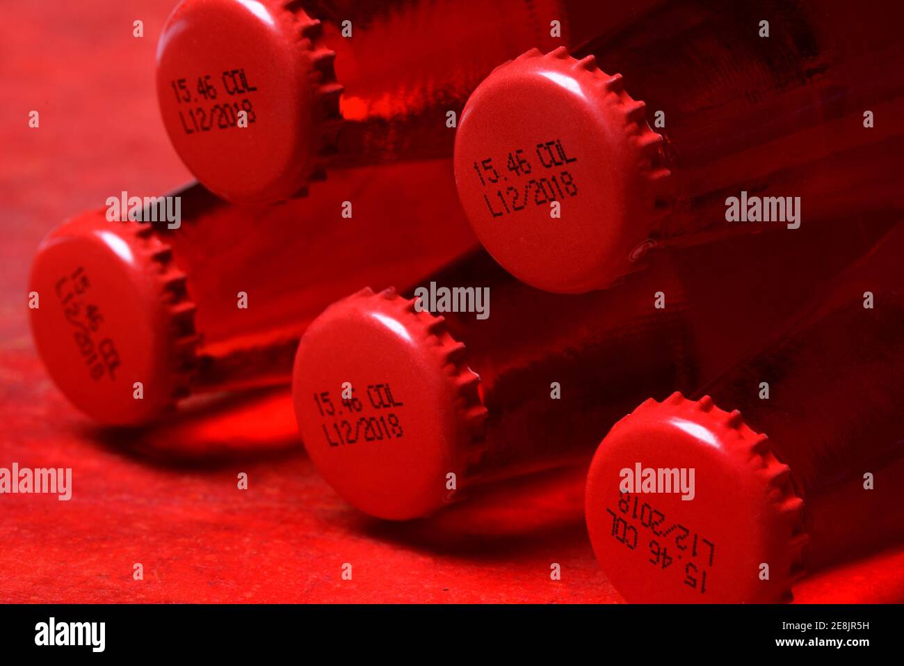 Crown cap with coding on bottles, coding, Campari Stock Photo - Alamy