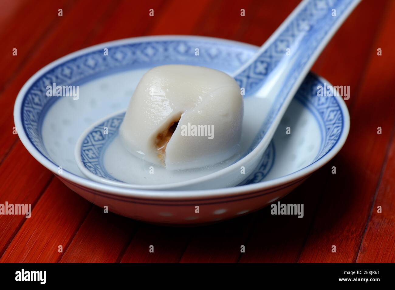 Sticky rice balls with peanut filling, Asian spoon Stock Photo - Alamy