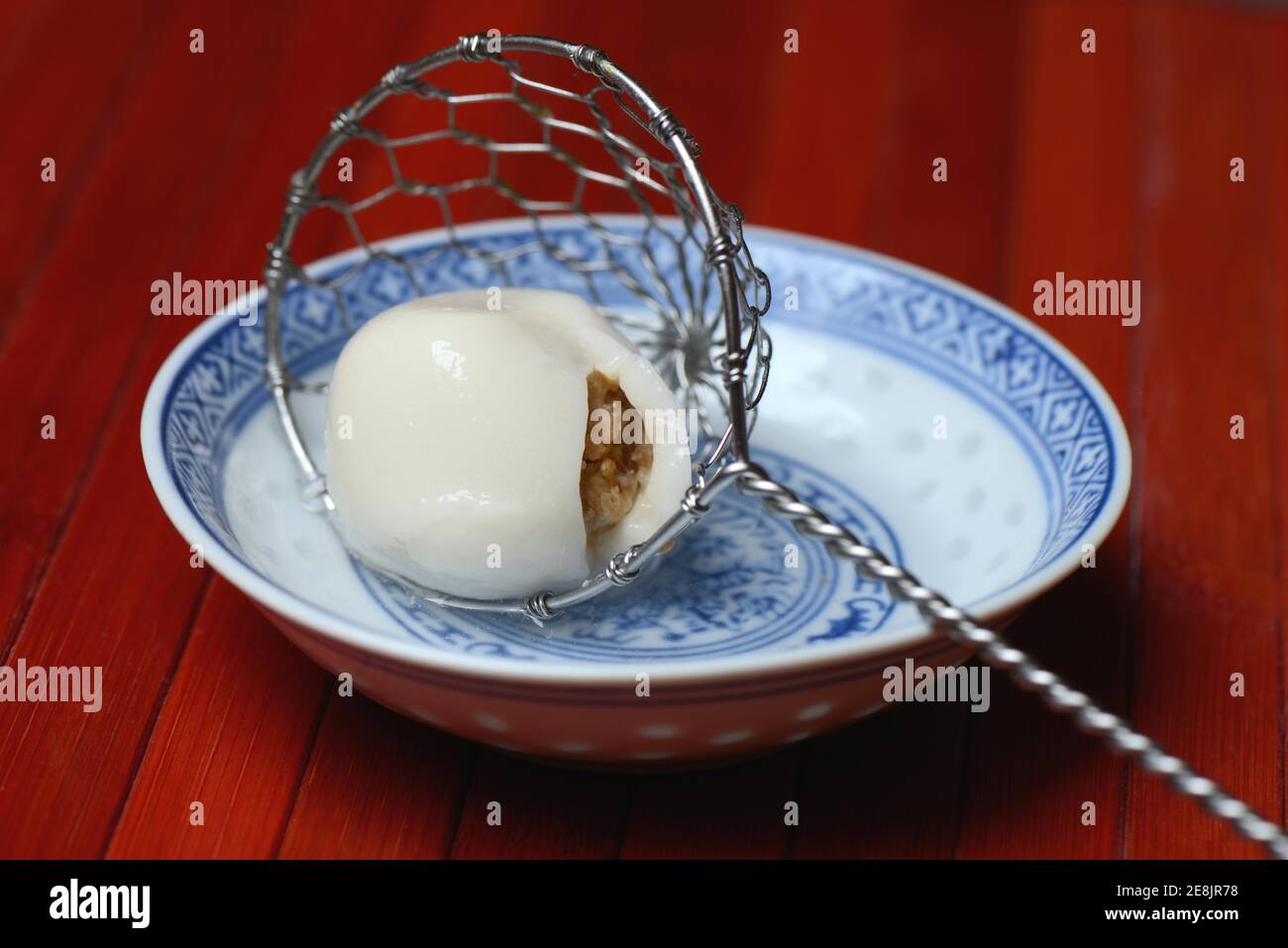 Boiled sticky rice balls with peanut filling Stock Photo - Alamy