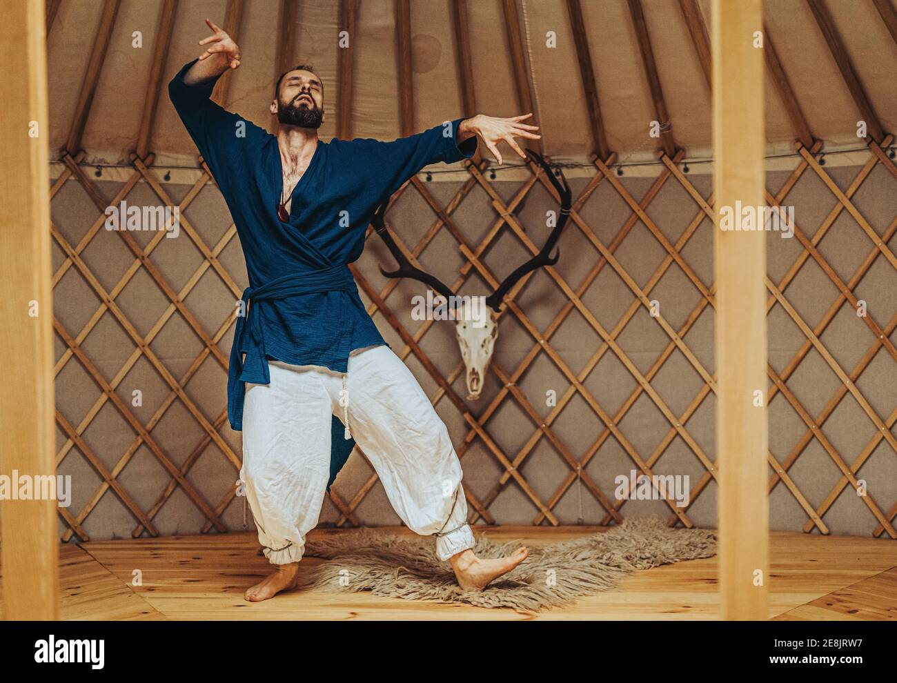 dancing warrior, ceremonial dance in a yurt Stock Photo - Alamy