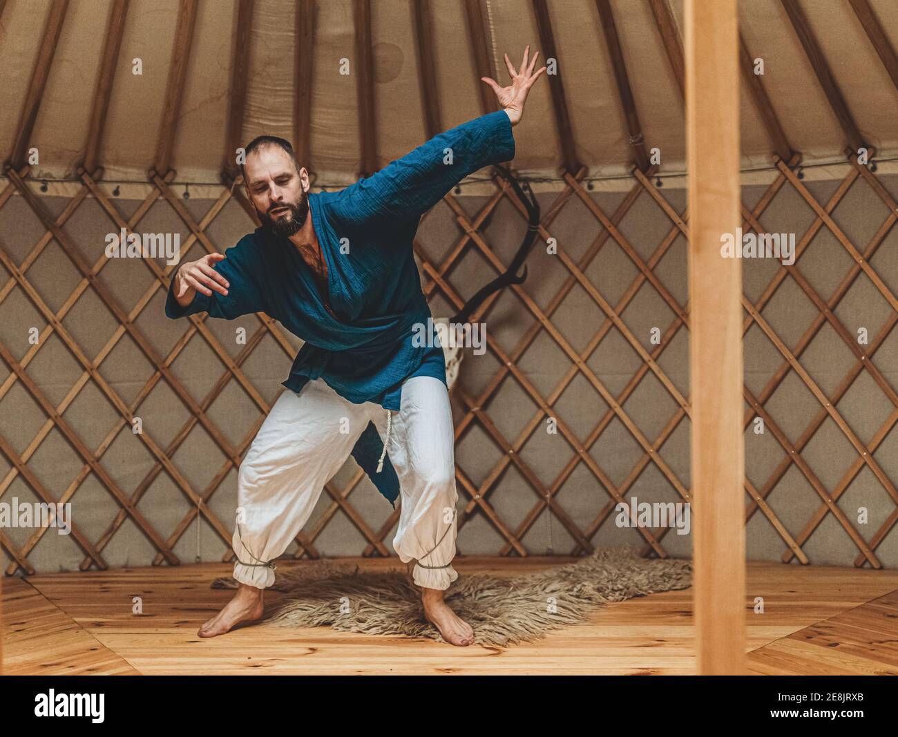 dancing warrior, ceremonial dance in a yurt Stock Photo - Alamy