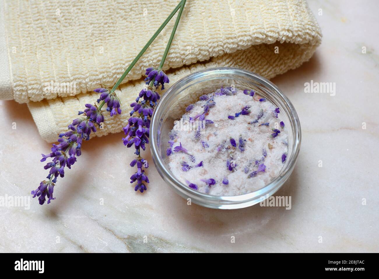 Lavender salt, sea salt with lavender flowers in a bowl, bath additive ...