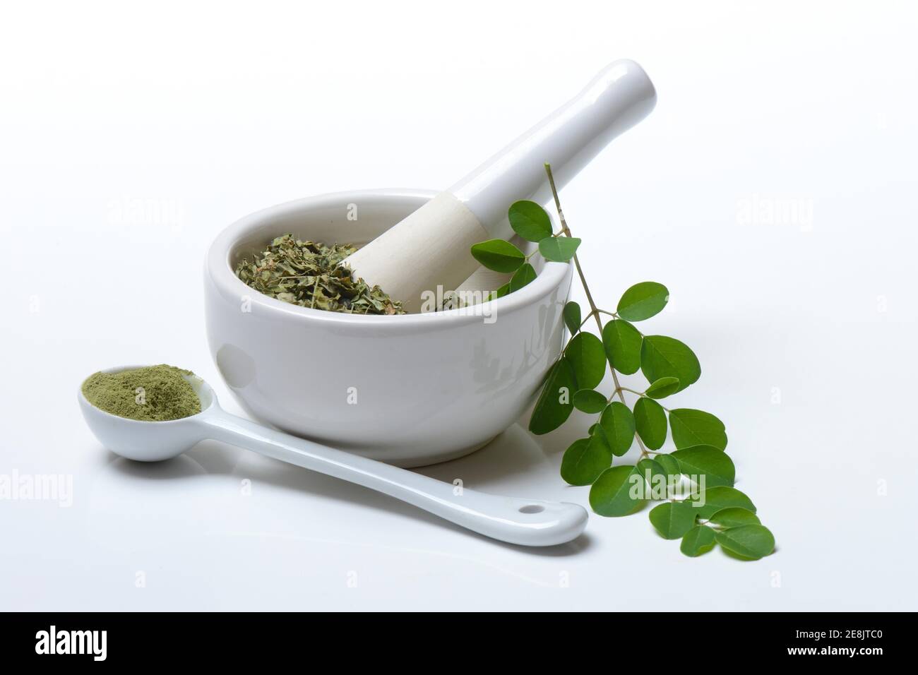 Moringa, Fresh Moringa leaves, dried Moringa leaves in grating bowl ...