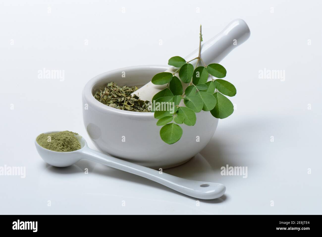 Moringa, Fresh Moringa leaves, dried Moringa leaves in grating bowl ...