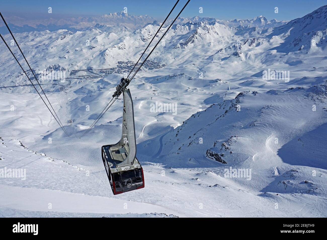 Gondola goes to the top of Cime de Caron, Trois Vallees ski resort ...