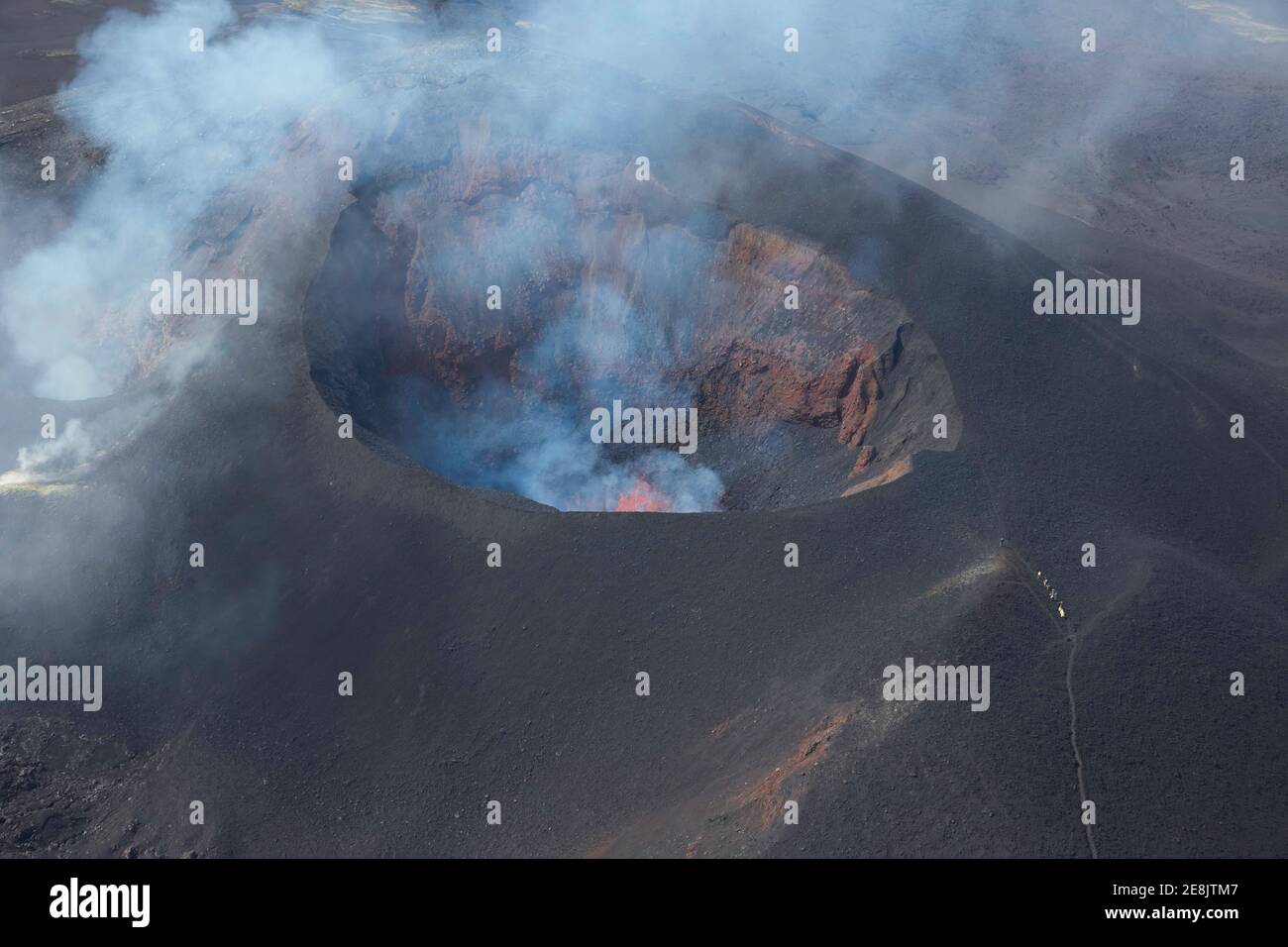 Aerial view, volcano Tolbatchik, crater with glowing lava and smoke ...
