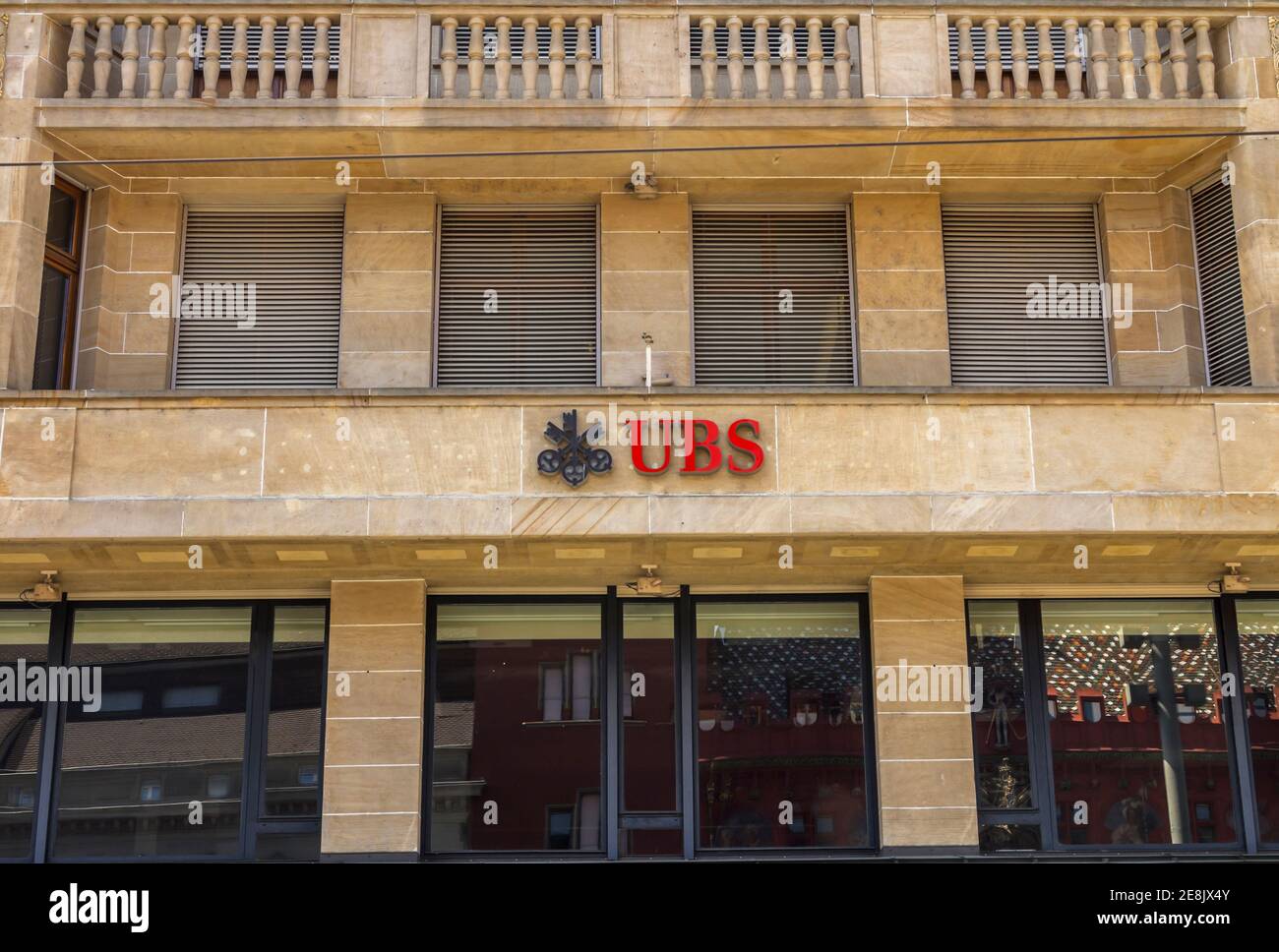 UBS sign on the wall of an UBS office building. UBS is a Swiss global ...