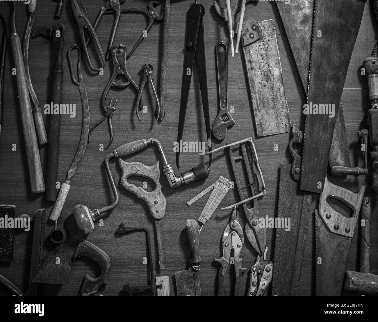 Old carpentry tools on an old workbench in black and white Stock Photo ...