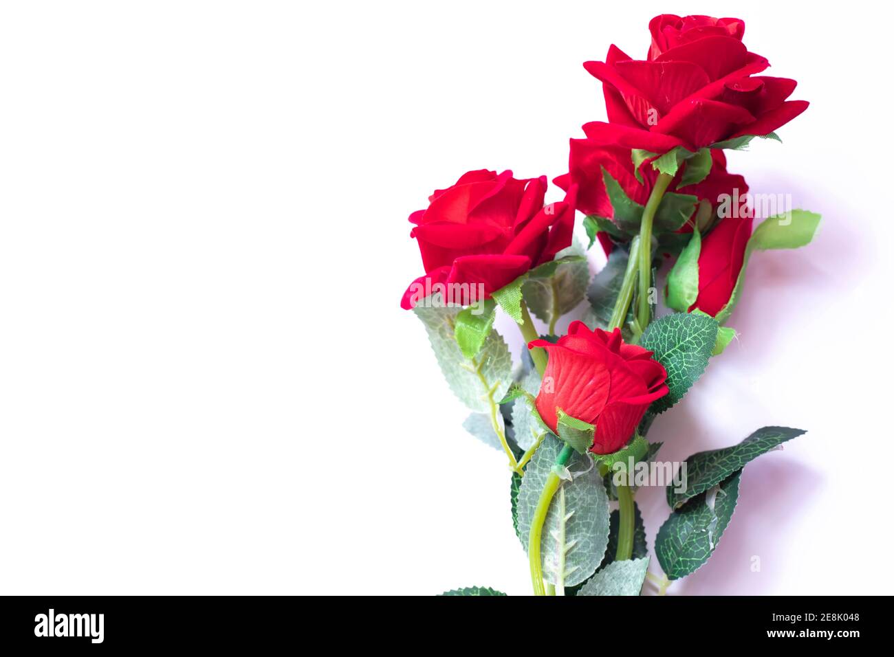 Bouquet of red roses on white backgrounds Stock Photo - Alamy