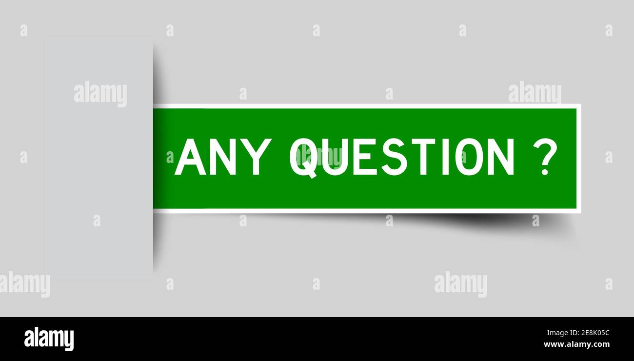 Inserted green color label sticker with word any question on gray ...