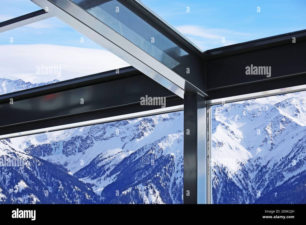 Interior view of a modern conservatory (winter garden) in an alpine ...