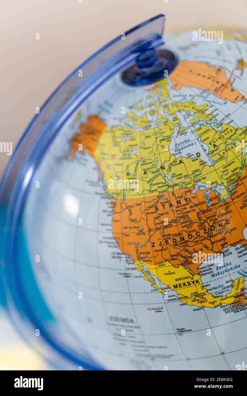 A vertical closeup shot of rotary world globe model Stock Photo - Alamy