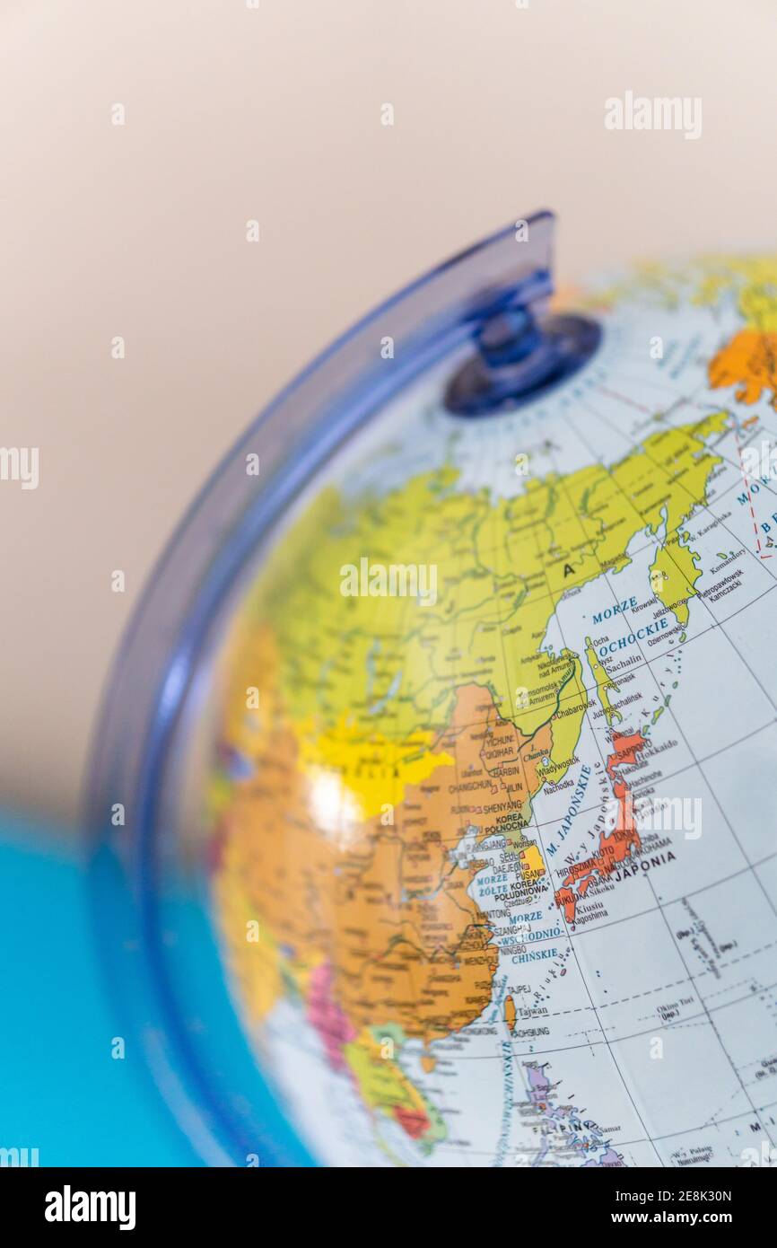 A vertical closeup shot of rotary world globe model Stock Photo - Alamy