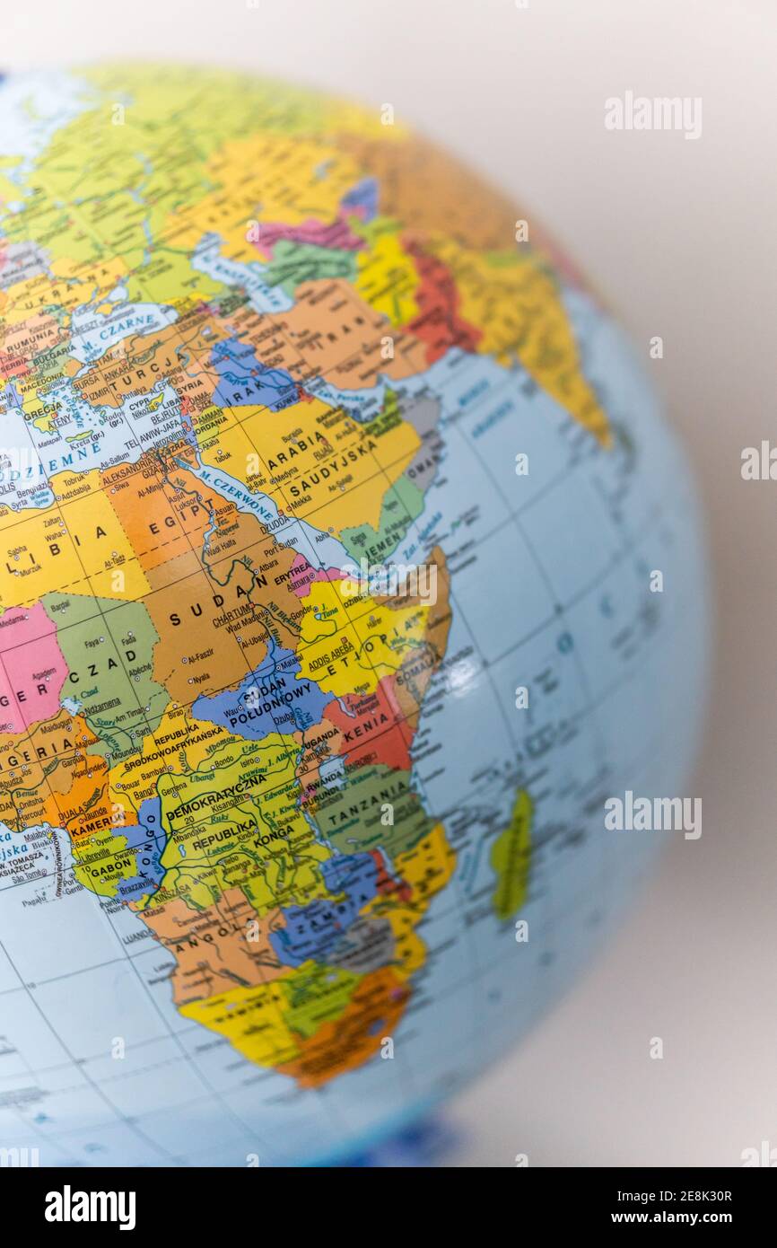 A vertical closeup shot of rotary world globe model Stock Photo - Alamy