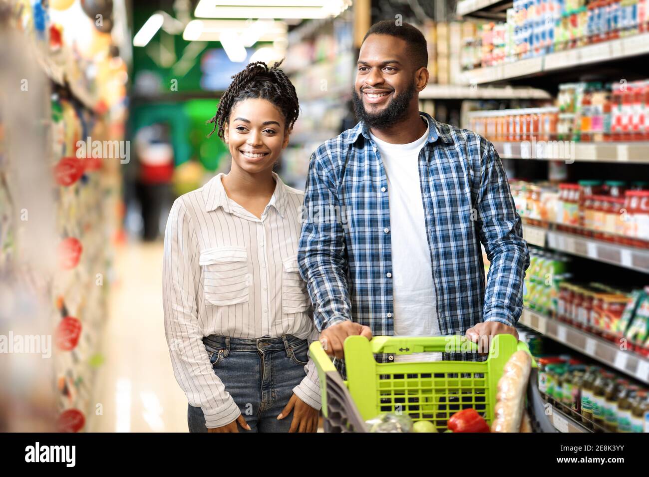 Happy African American Family Doing Groceries Shopping In Supermarket ...