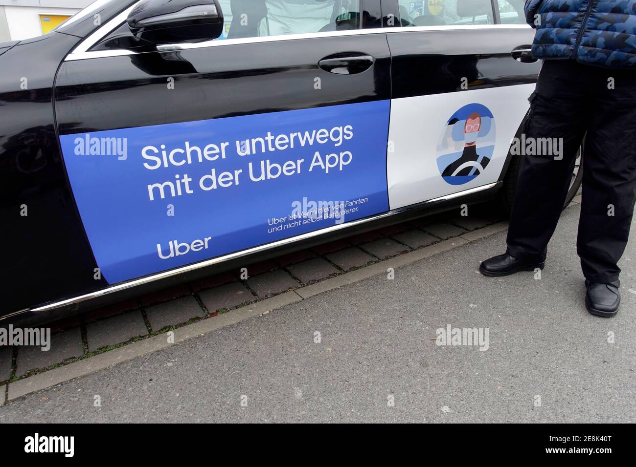 Uber car and driver in Berlin Stock Photo - Alamy