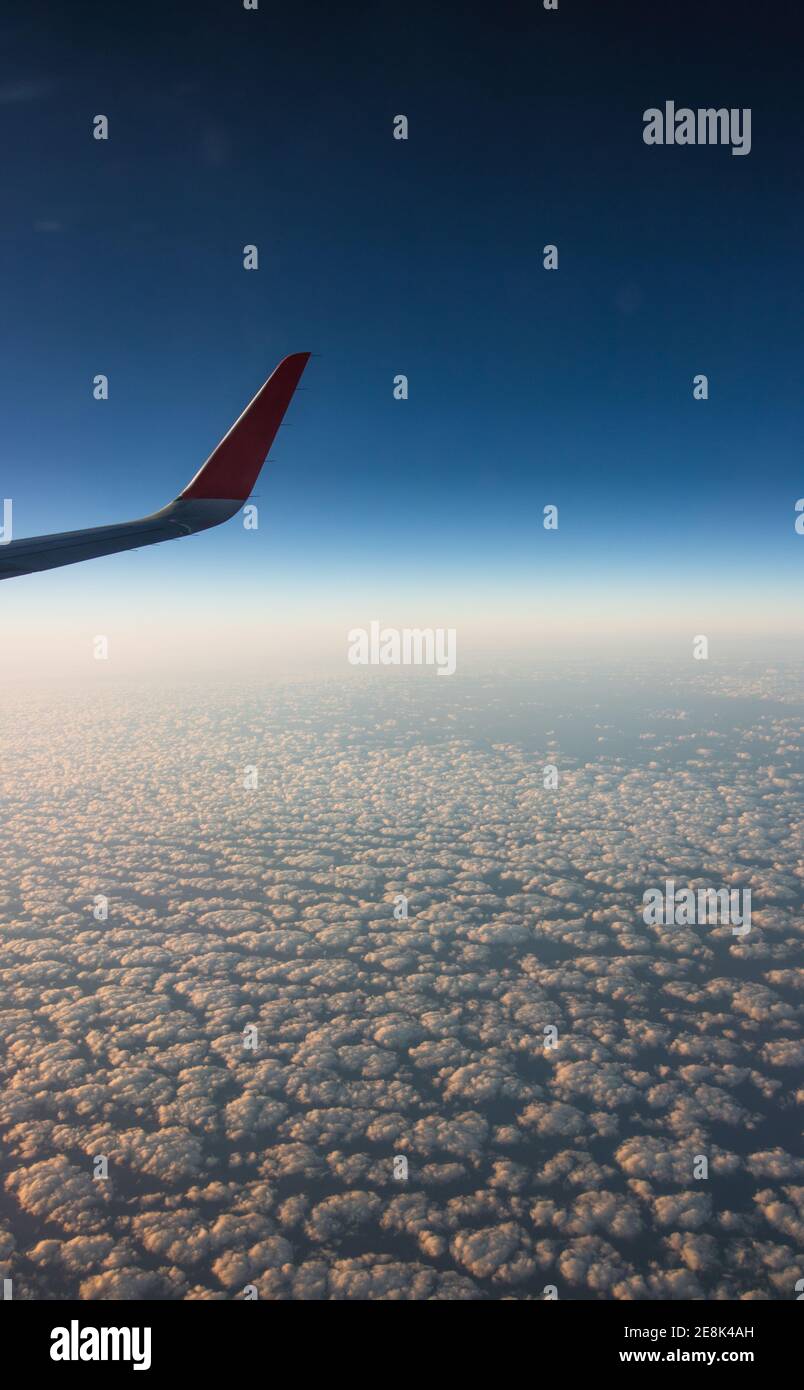Travel view window plane with mountains and clouds at background Stock ...